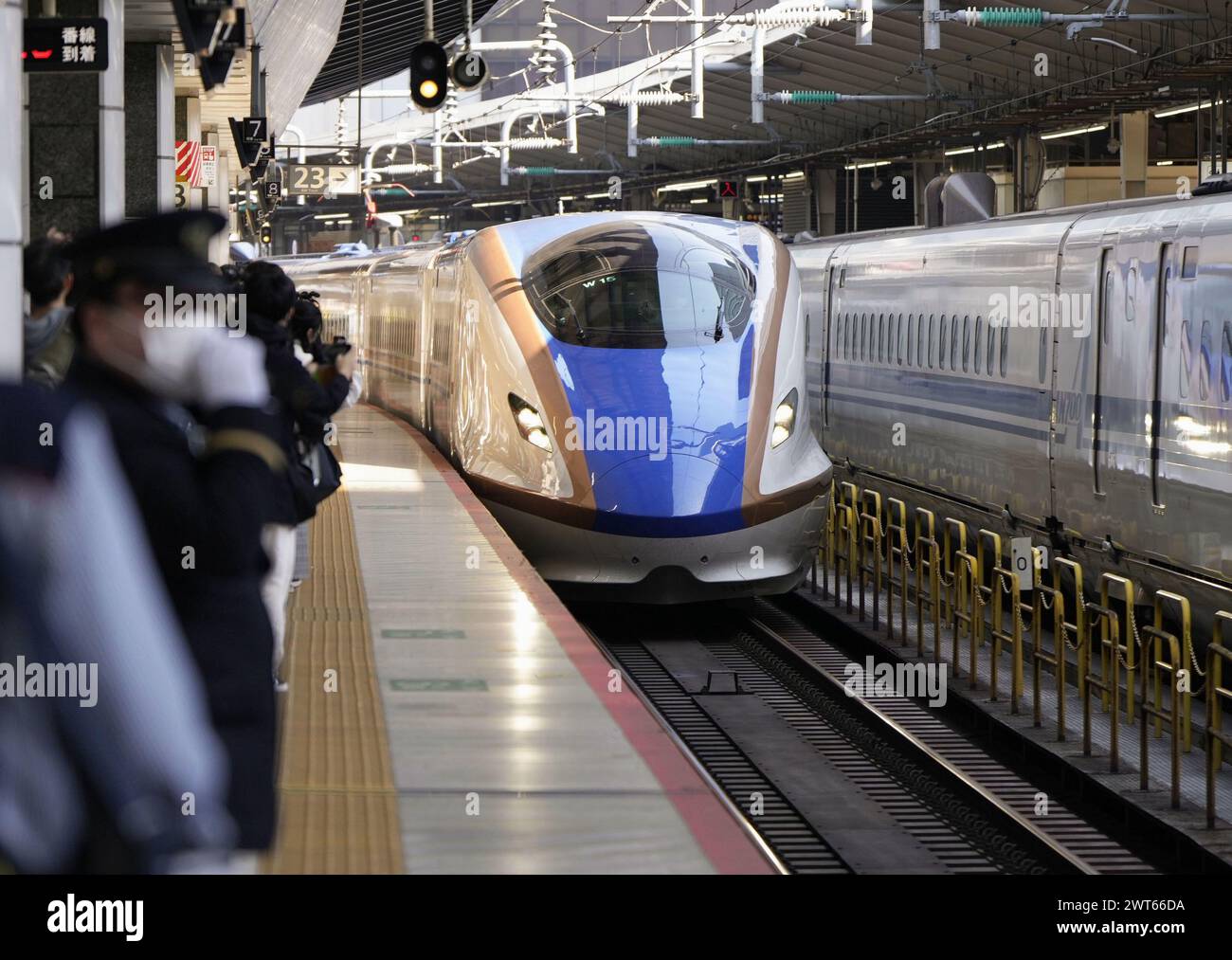 The first train bound for Tokyo from Tsuruga in Fukui Prefecture, central Japan, arrives at JR ...
