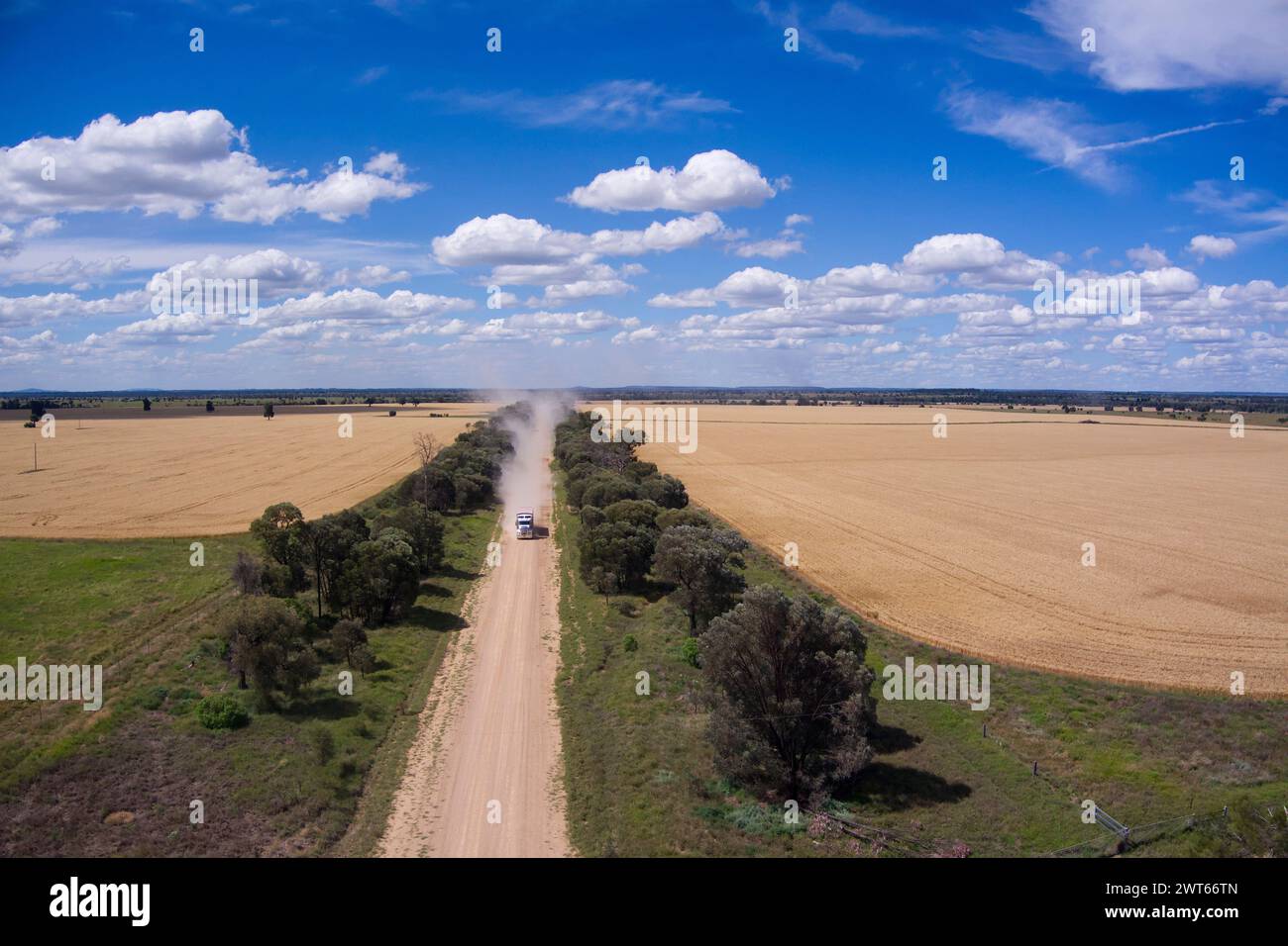 Aerial of truck coming to collect the wheat harvest Wallumbilla on the ...