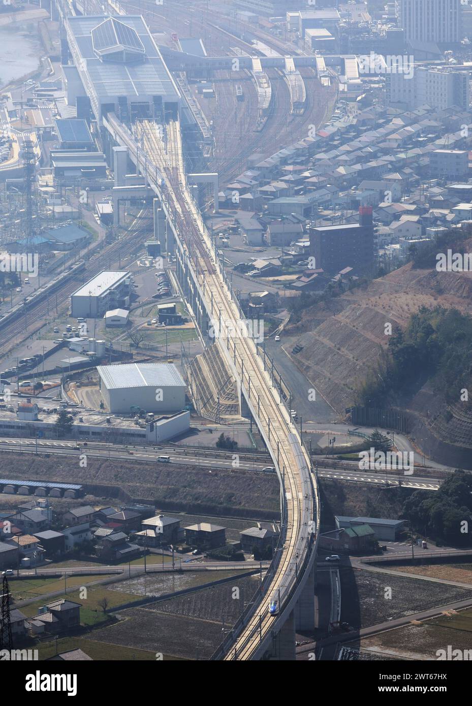 The Hokuriku Shinkansen departs from Tsuruga Station in Tsuruga City ...