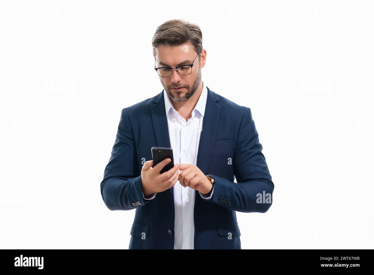 Business man in business suit using smart phone. Portrait attractive ...