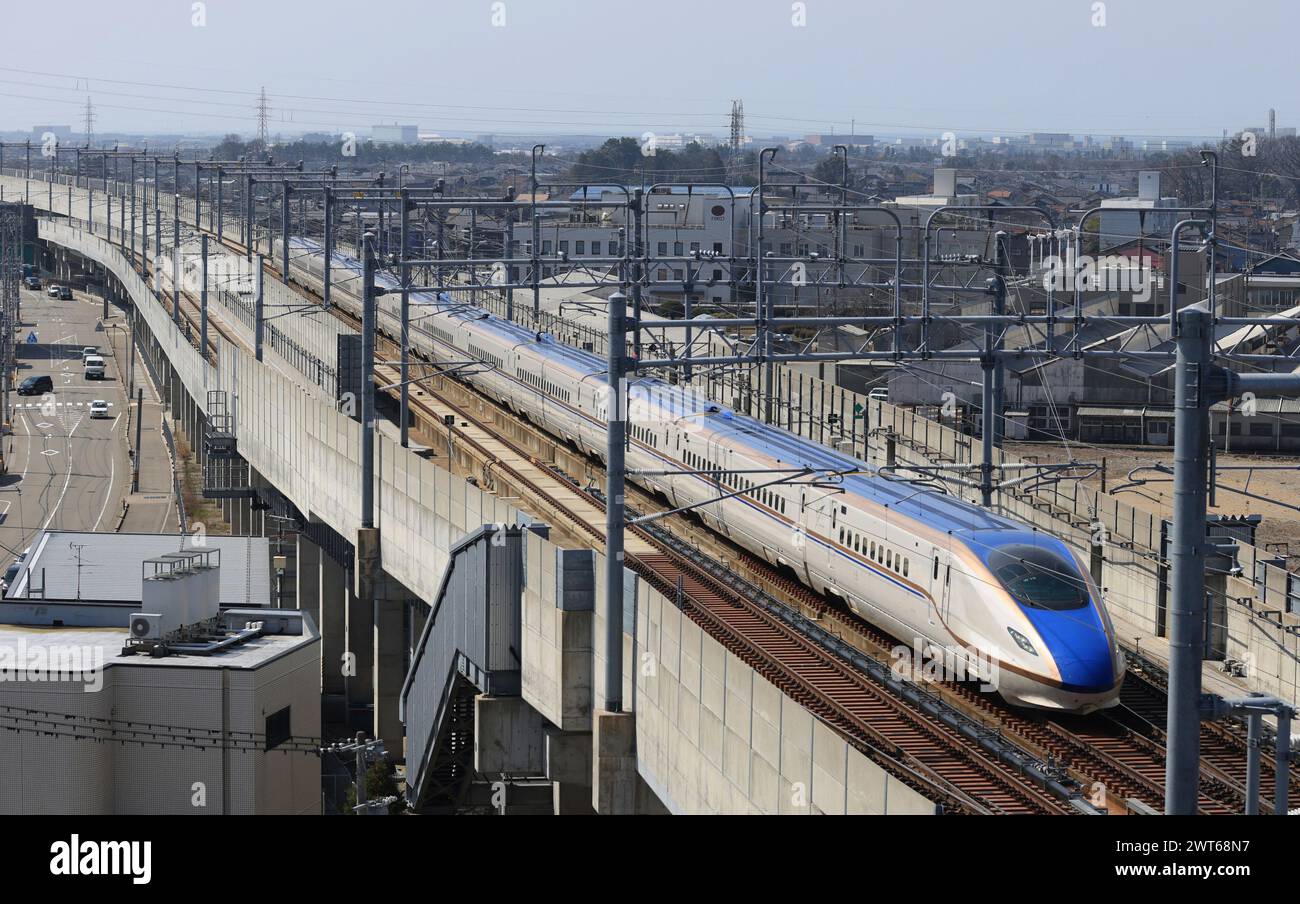 The Hokuriku Shinkansen runs in Hakusan City, Ishikawa Prefecture on ...