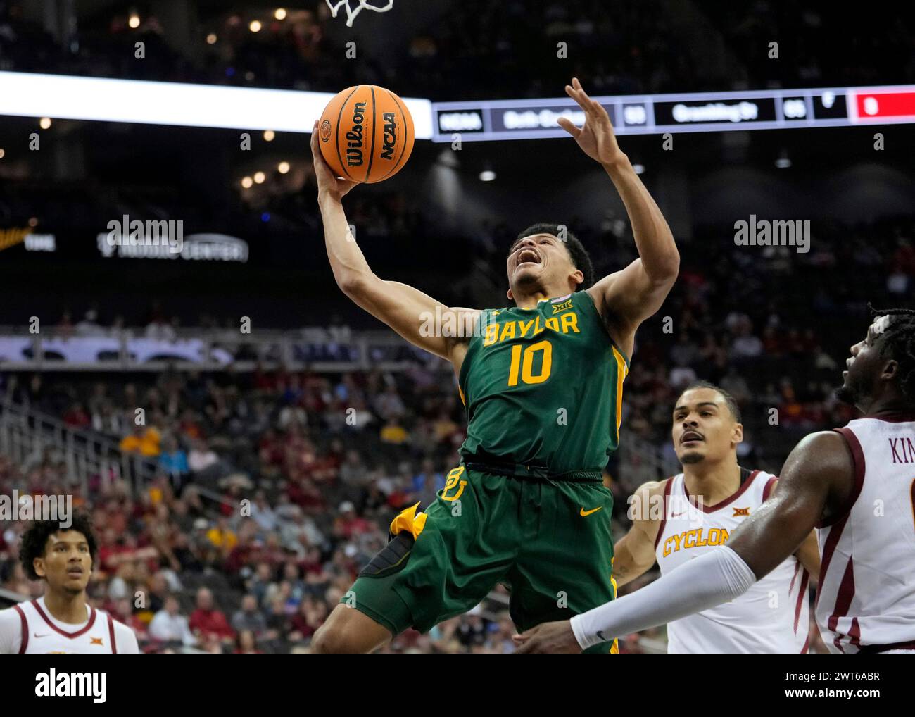 MAR 15 2024: Baylor Bears guard RayJ Dennis (10) makes it to the goal ...