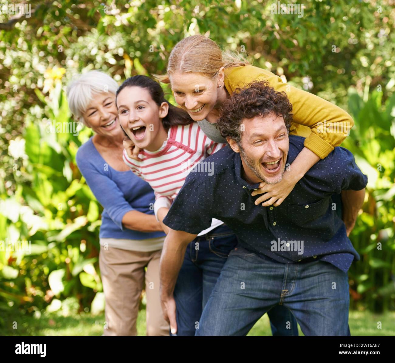 Family, fun and playing in outdoor nature, love and bonding together or ...