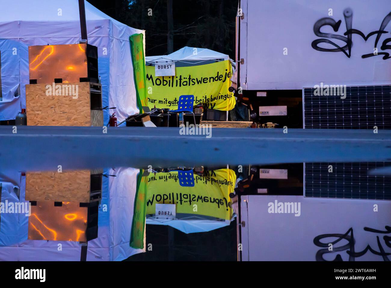 16 March 2024, Brandenburg, Grünheide: A vigil has been set up in front ...