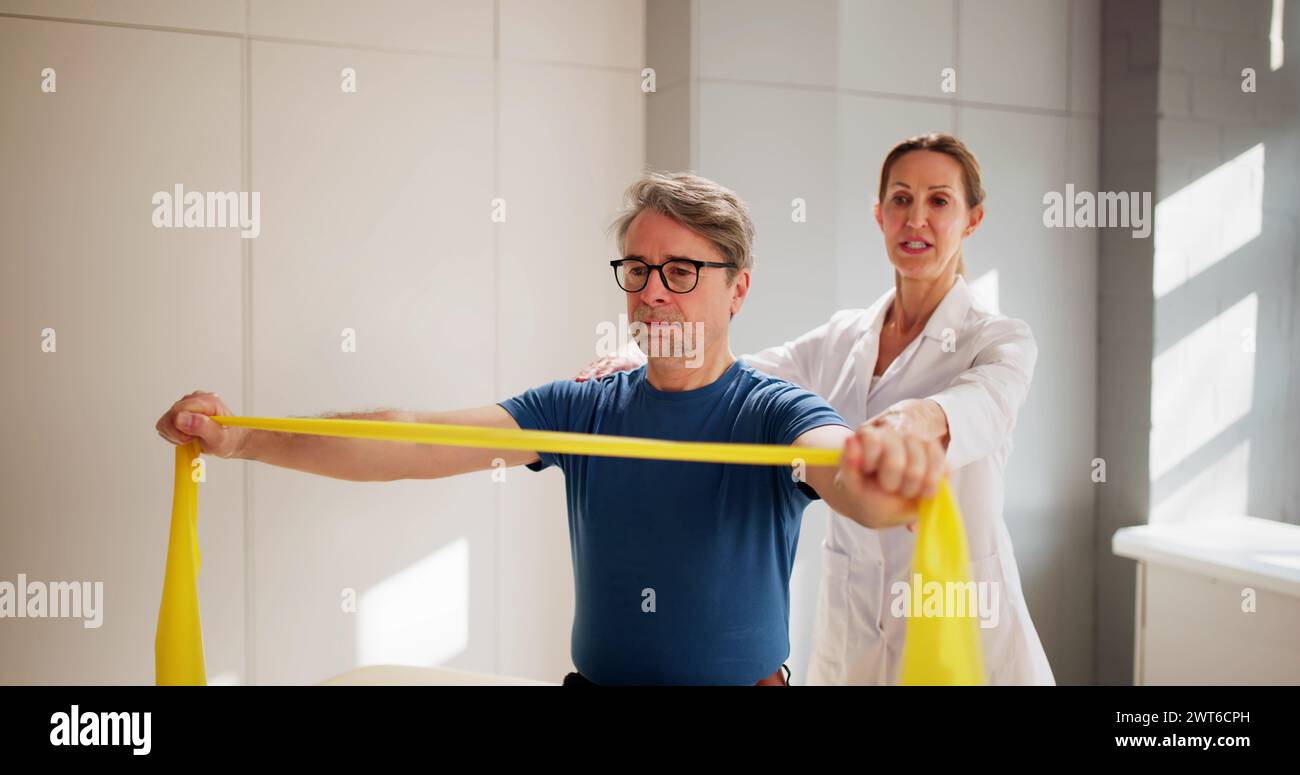 Elder patient doing physical exercise hi-res stock photography and ...
