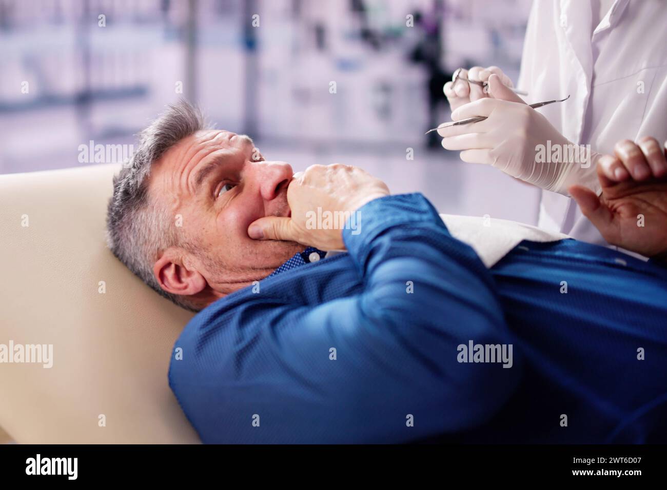 Scared Patient At Dentist. Toothache And Teeth Treatment Stock Photo ...