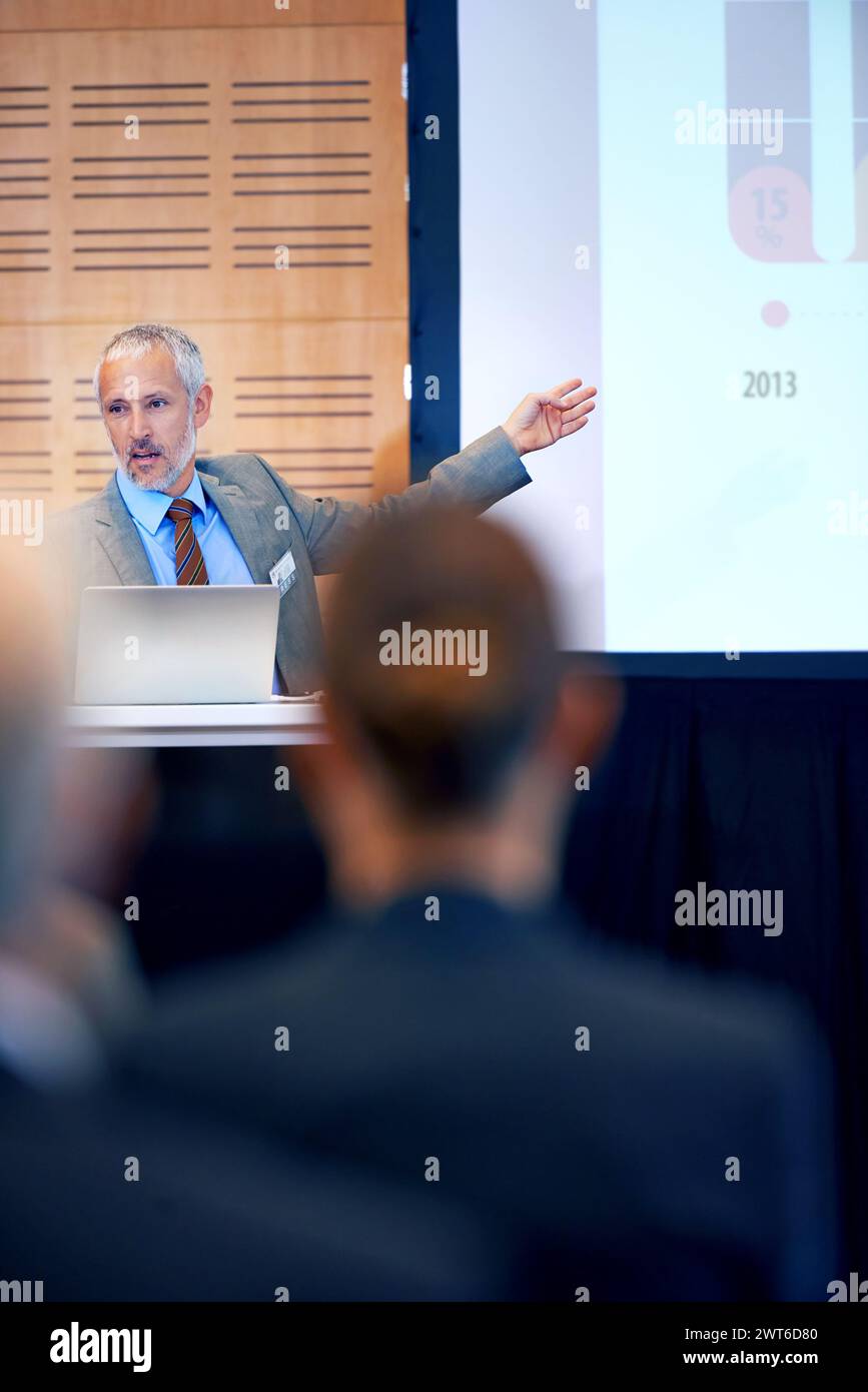 Senior, businessman and boss with presentation on projector for meeting ...