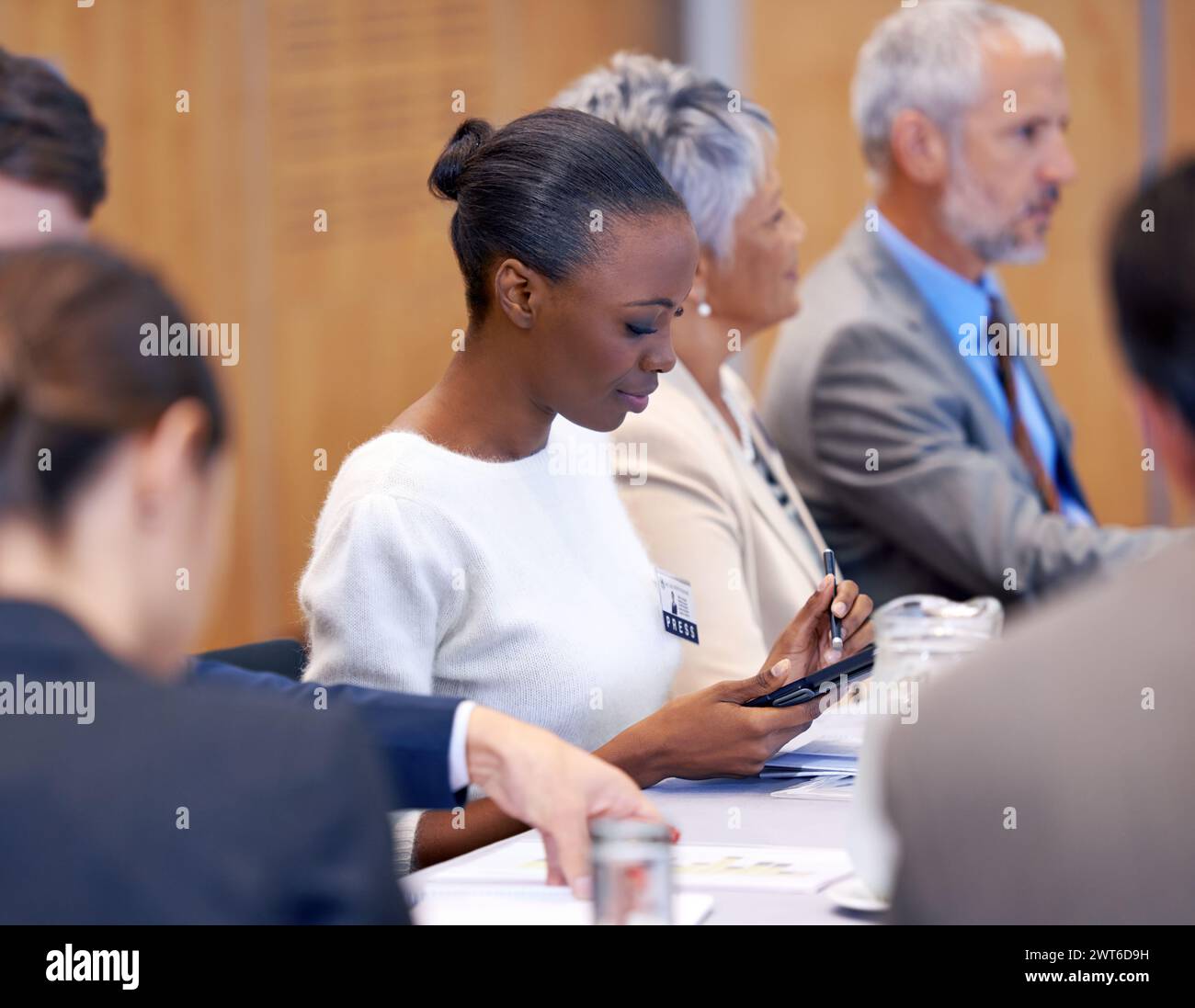 Meeting room, tablet and secretary in boardroom with notes for business ...