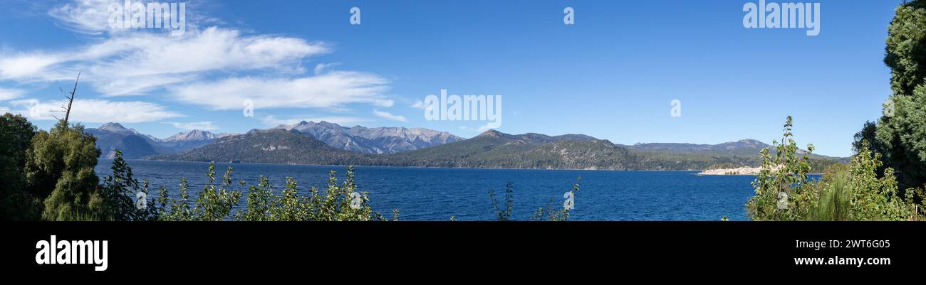 Beautiful fresh nature view of the shore of a crystaline wavy river ...