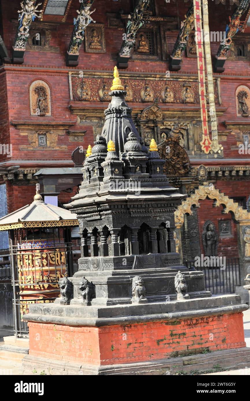 Detailed Hindu temple with sculptures and ceremonial flags in Nepal ...