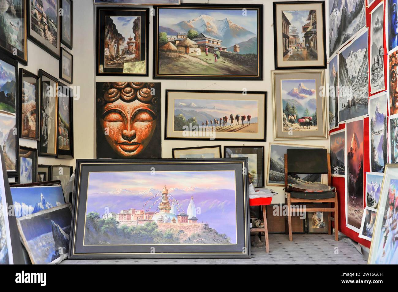 An art gallery with an eclectic collection of paintings and wall ...