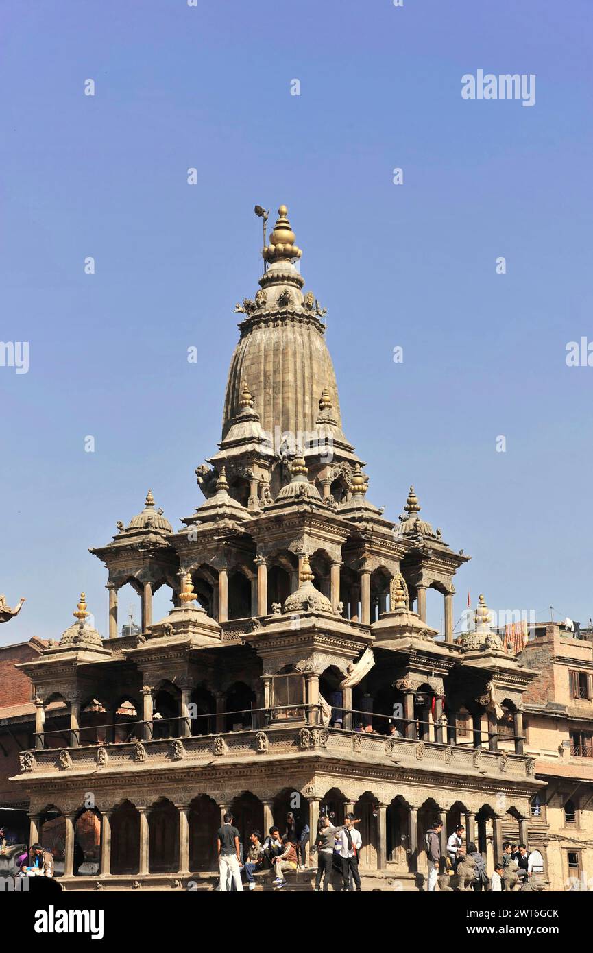 Magnificent temple tower with fine decorations under a blue sky ...