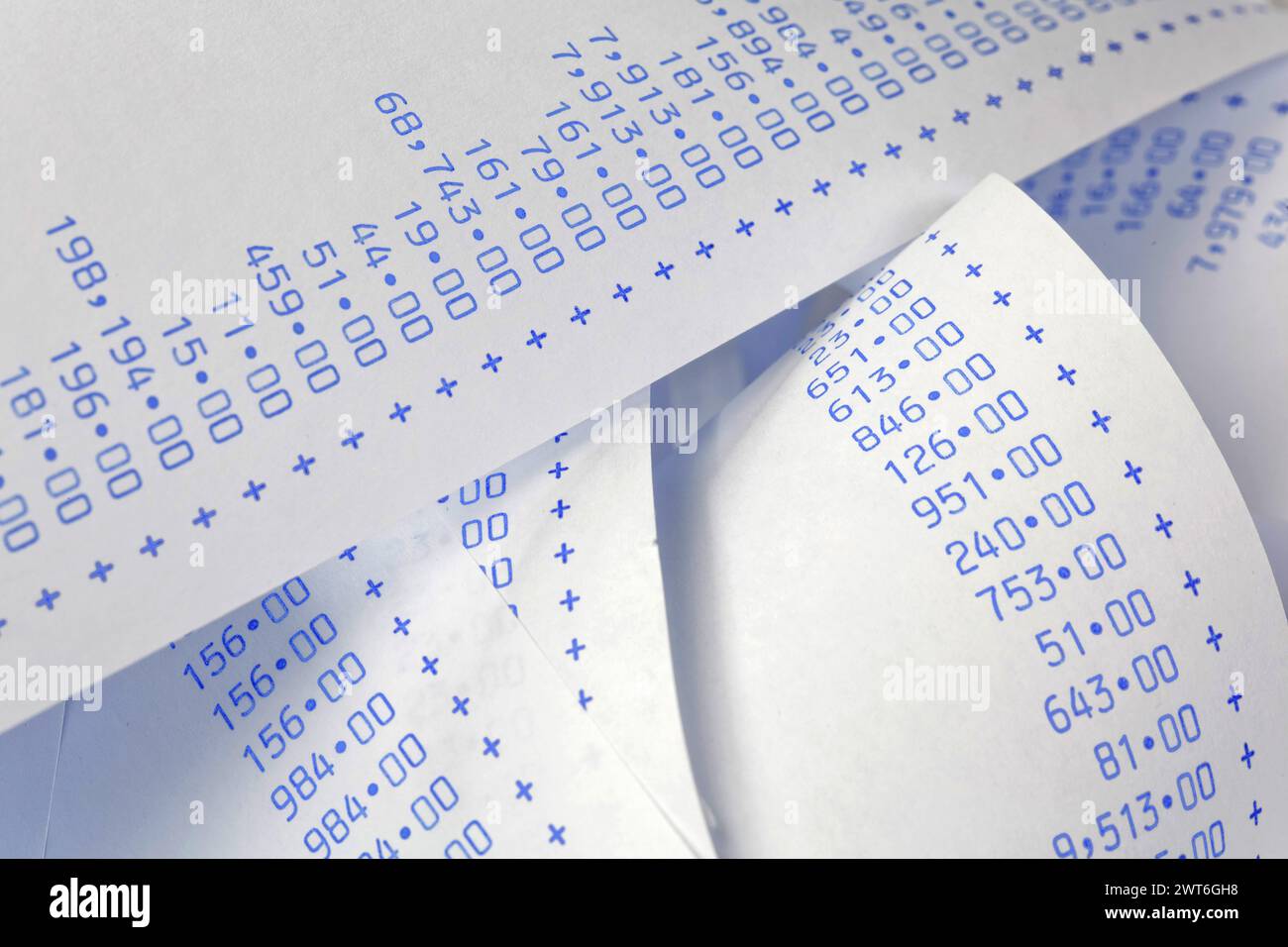 A calculation strip with lots of numbers, studio Stock Photo - Alamy