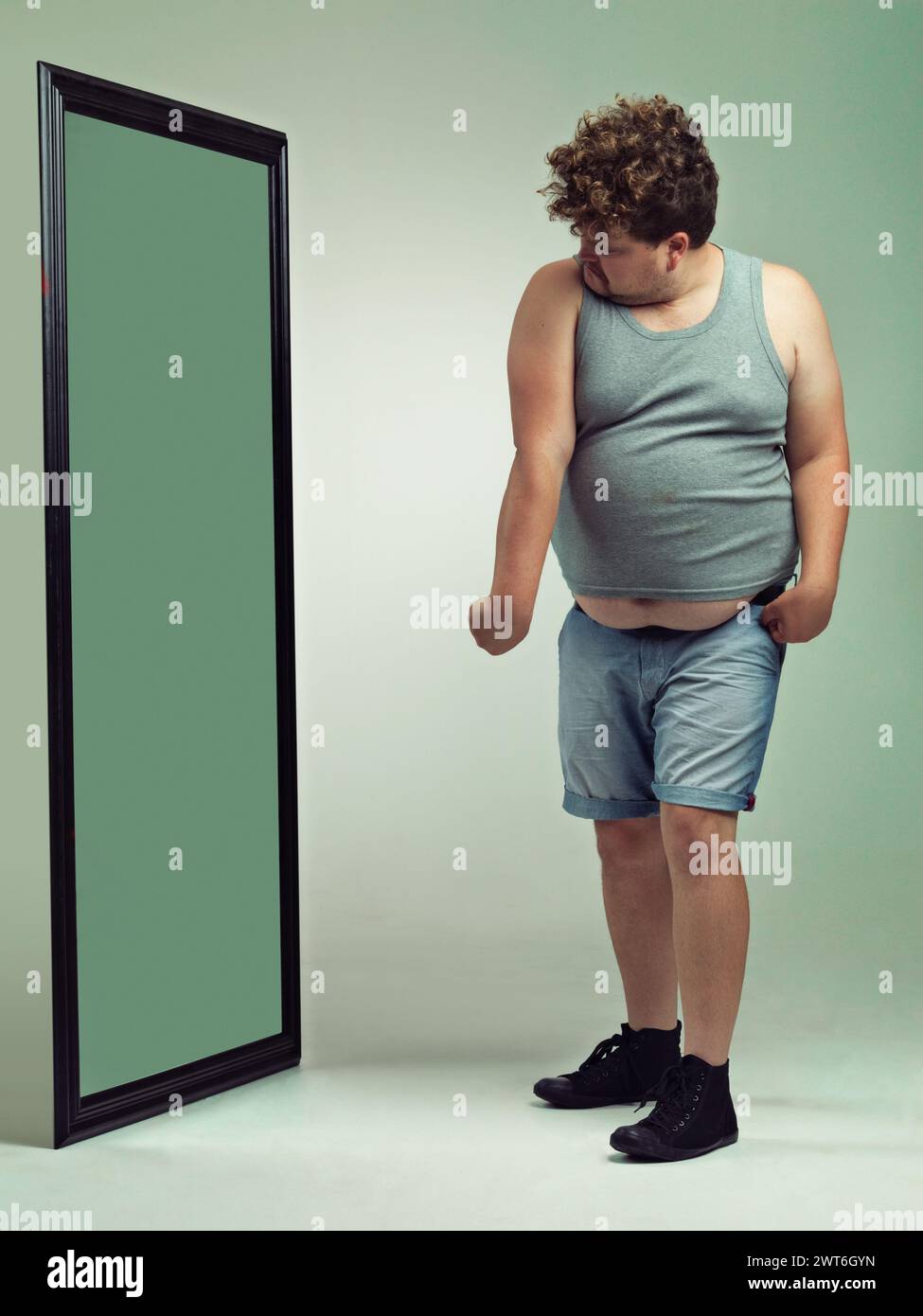 Man, flex and body image in mirror for eating disorder, anxiety and ...