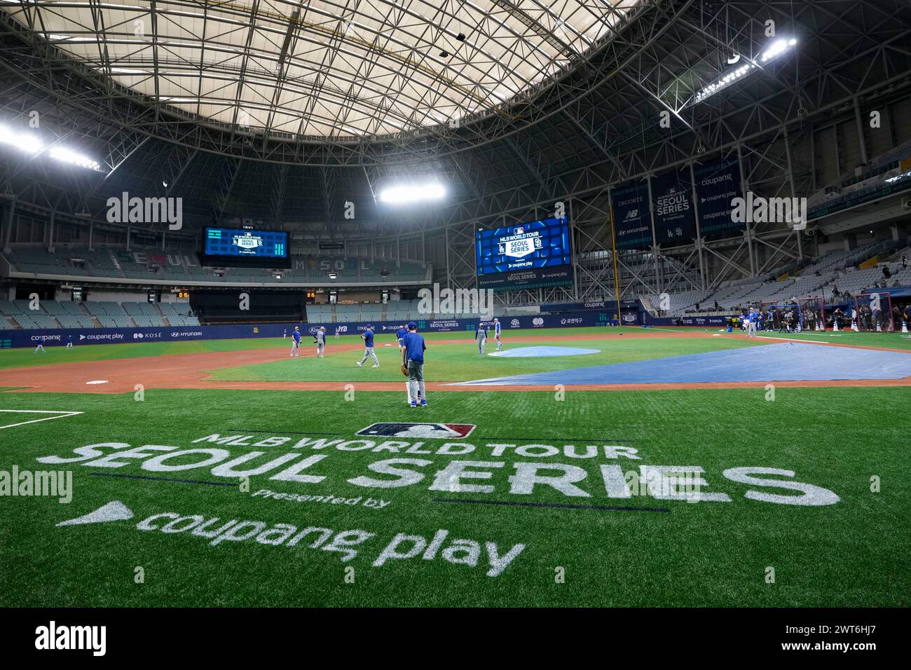 Los Angeles Dodgers players take the field during a baseball workout at the Gocheok Sky Dome in ...