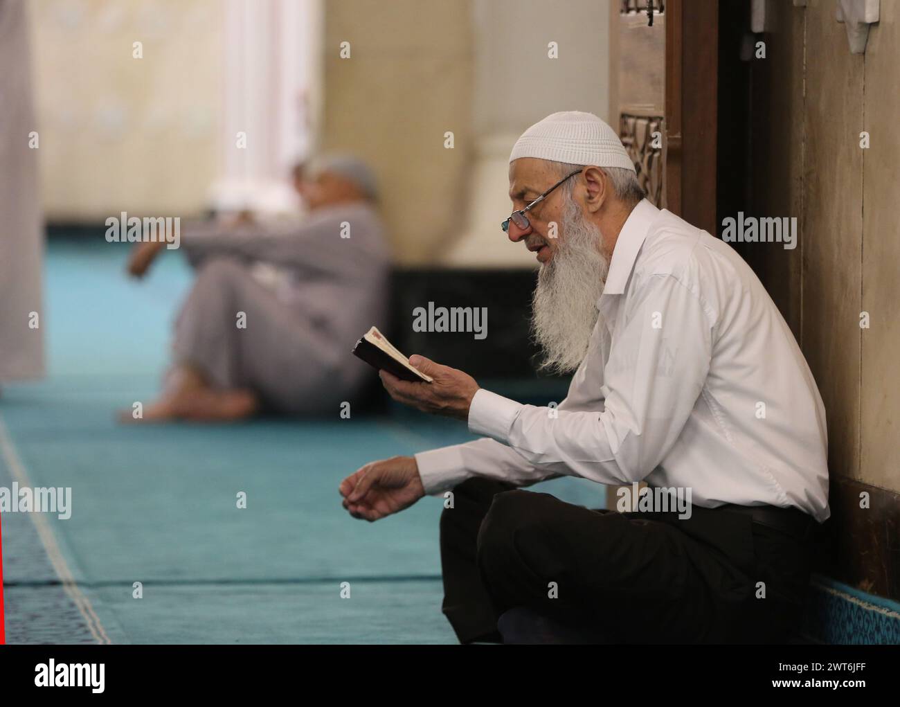 Baghdad, Iraq. 15th Mar, 2024. A man attends the first Friday prayer of ...