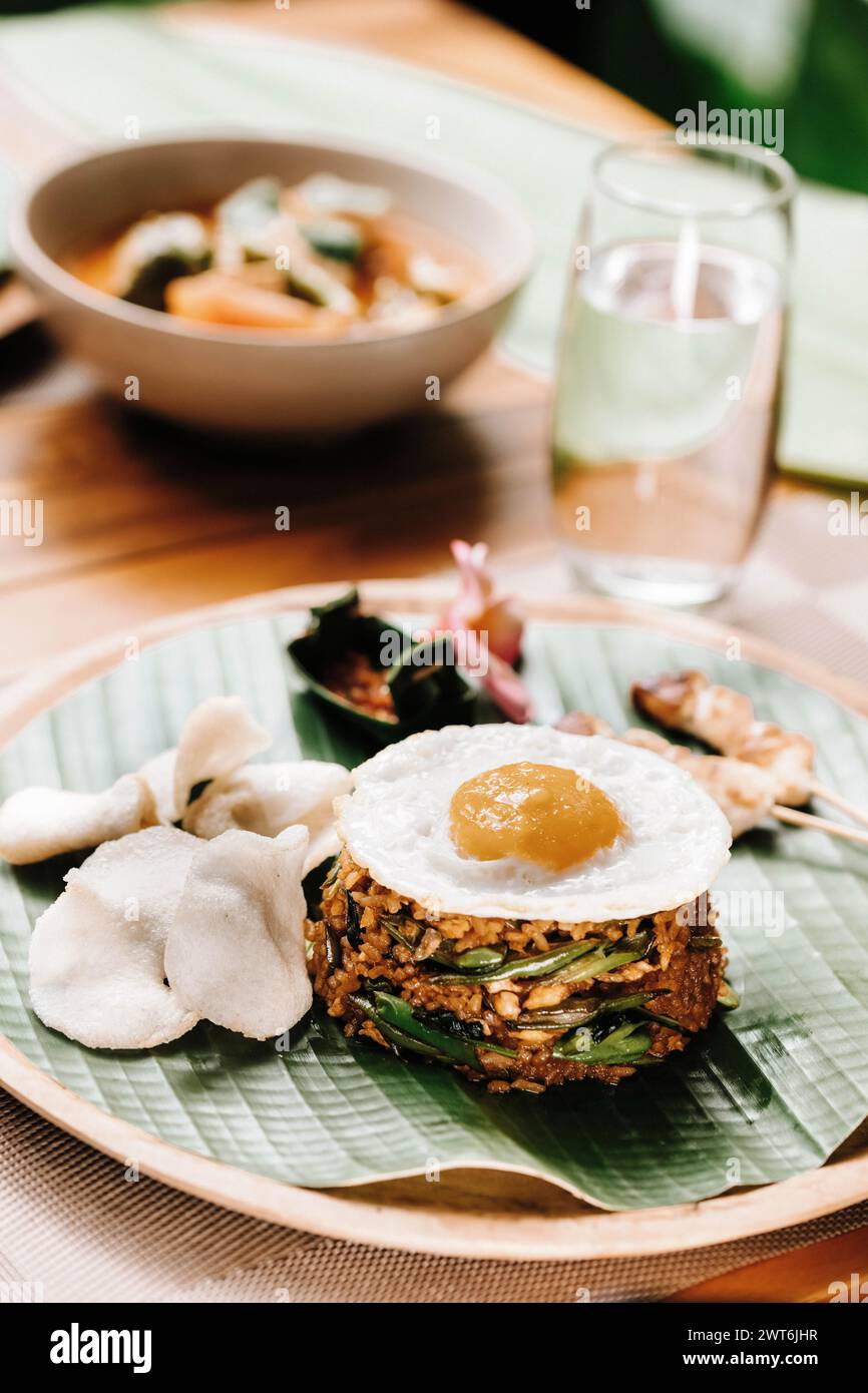 delicious fried rice with sunny side up egg and prawn crackers, served ...