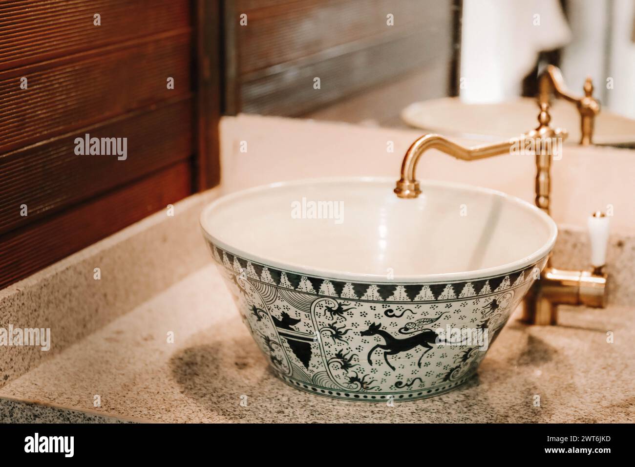 ceramic sink with batik pattern on a restroom Stock Photo - Alamy