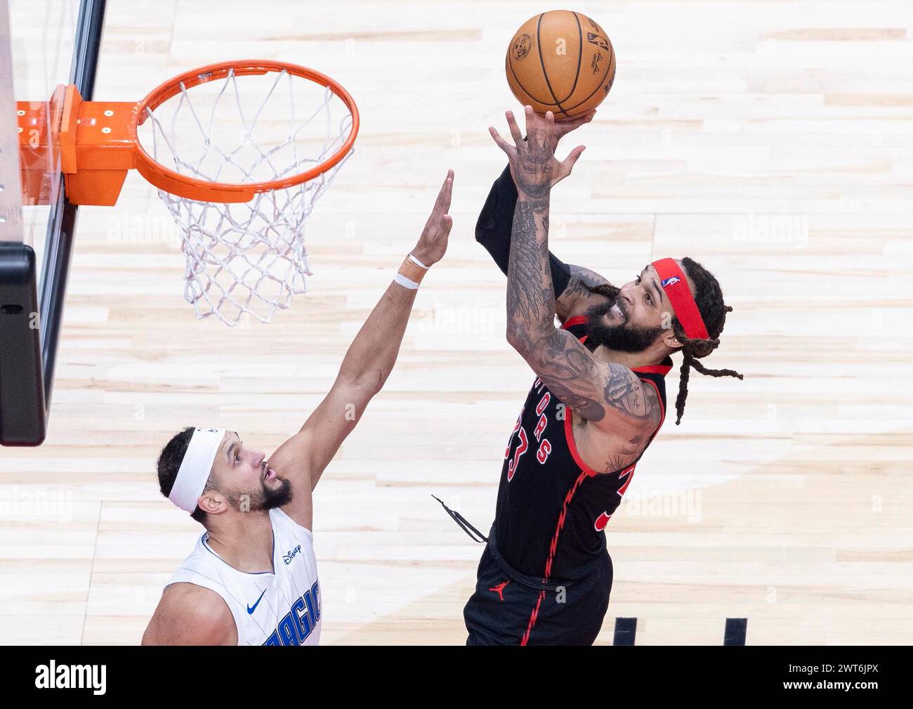 Toronto, Canada. 15th Mar, 2024. Gary Trent Jr. (R) of Toronto Raptors ...