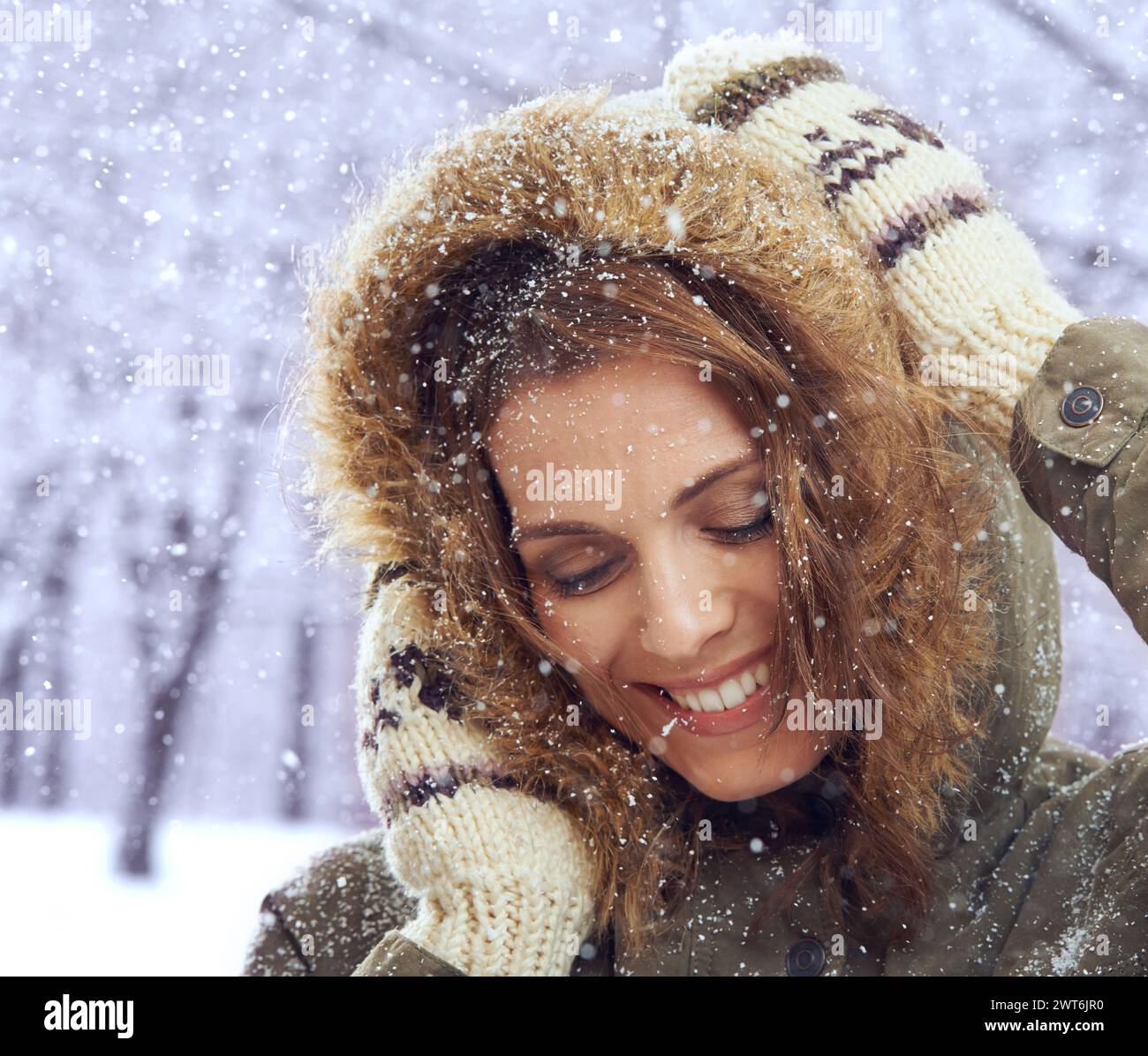 Woman, snow and smile with winter fashion for cold weather and climate ...