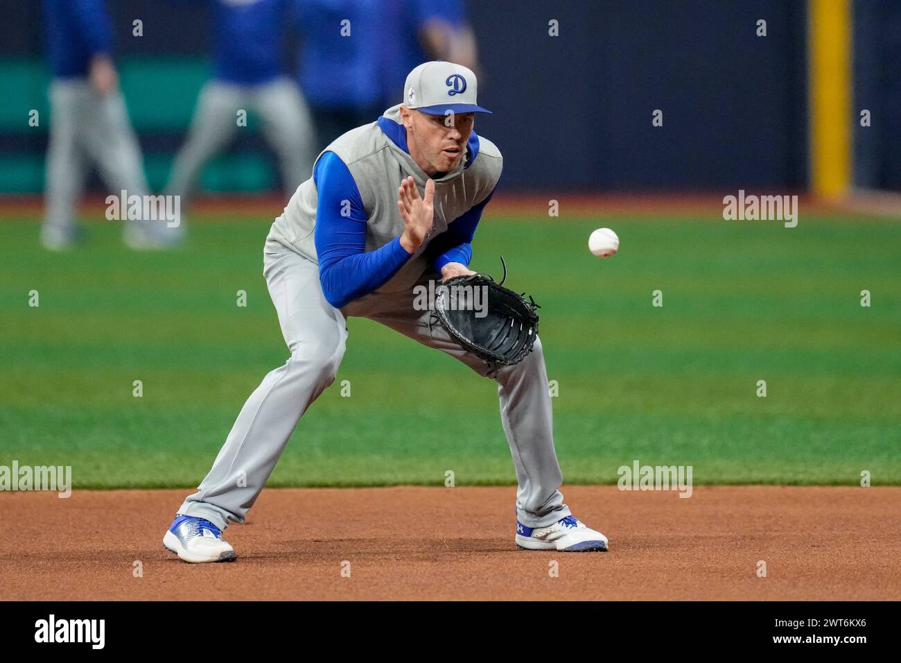 Los Angeles Dodgers' Freddie Freeman fields a ground ball during a ...