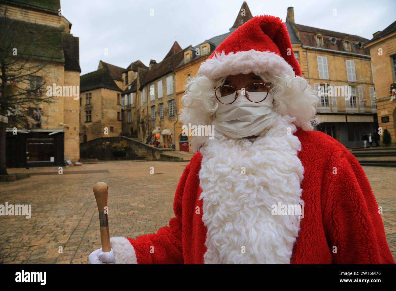 Santa Claus and Covid-19. Santa Claus wears a protective face mask ...