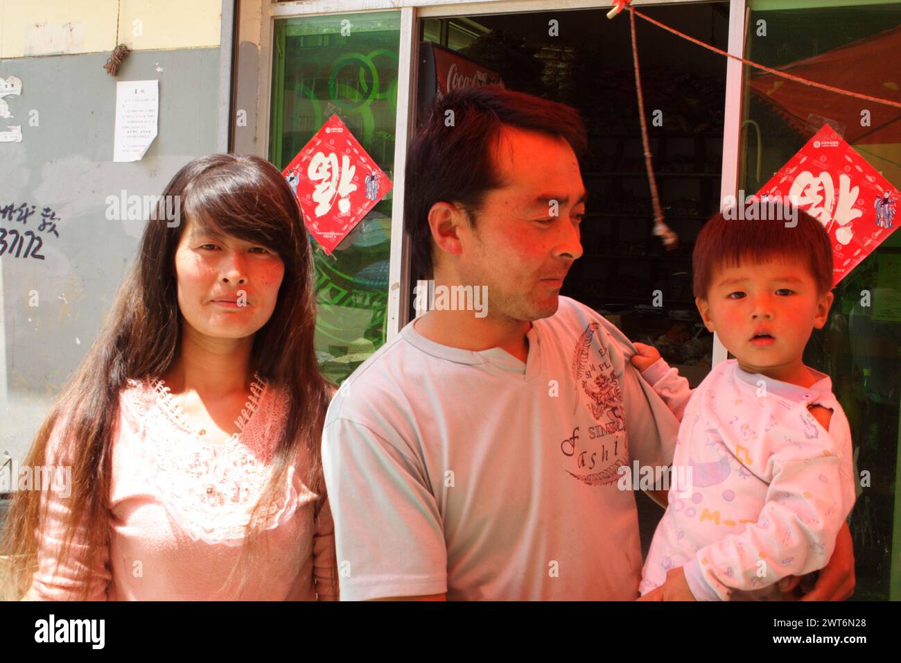 Chinese family with small boy hi-res stock photography and images - Alamy