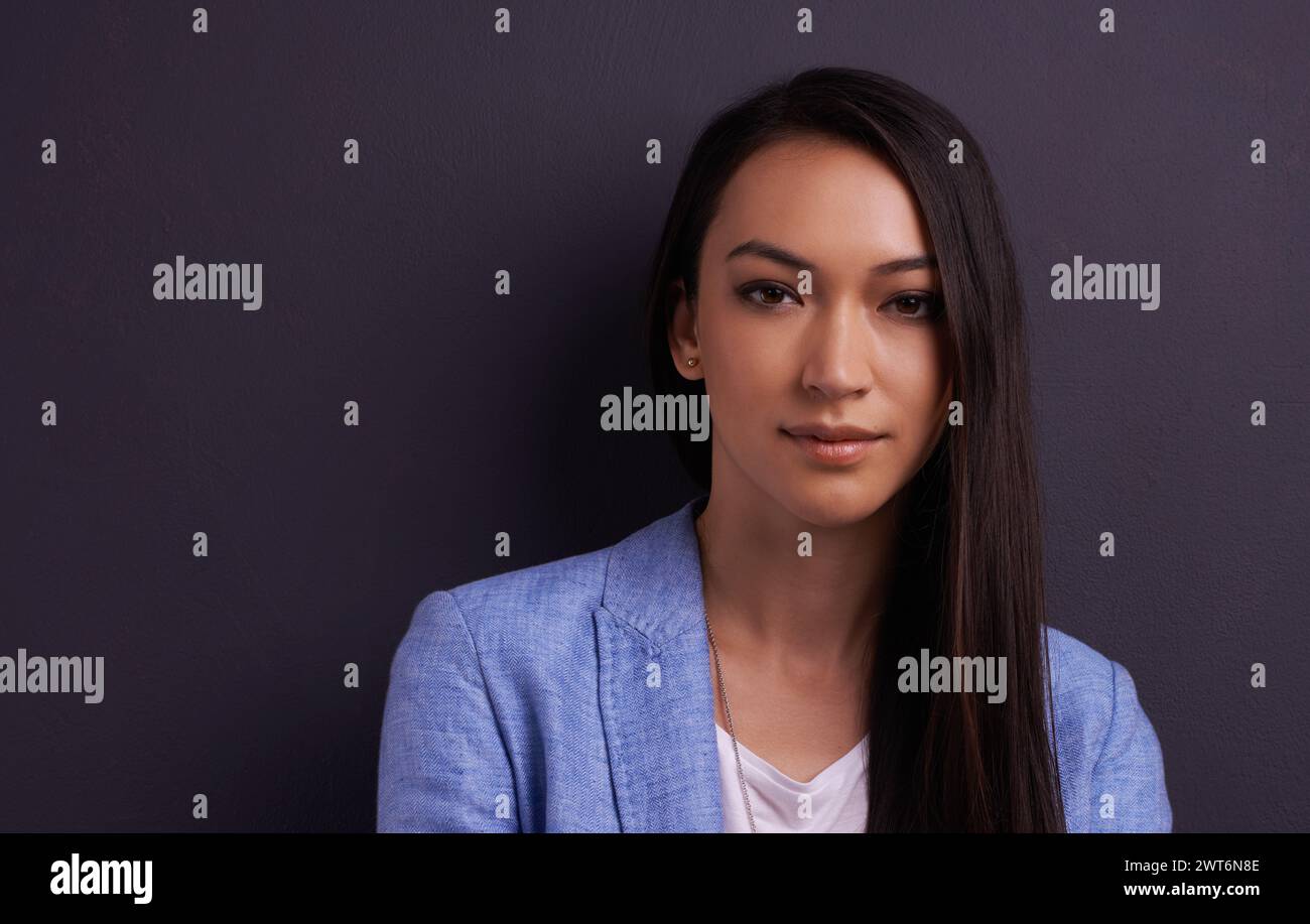 Portrait, serious and business woman in studio isolated on a grey ...