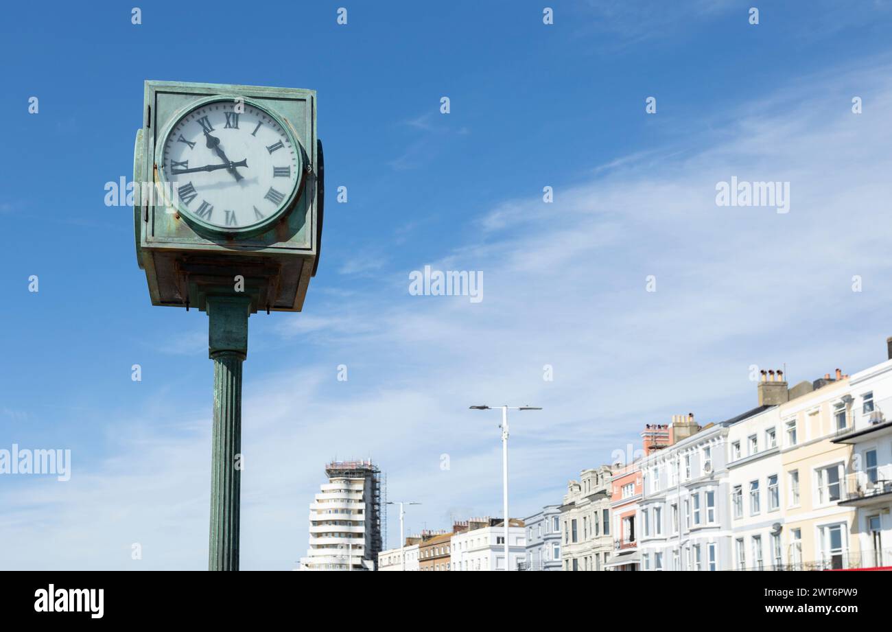 A public clock on the seafront at St Leonards, East Sussex, UK Stock ...