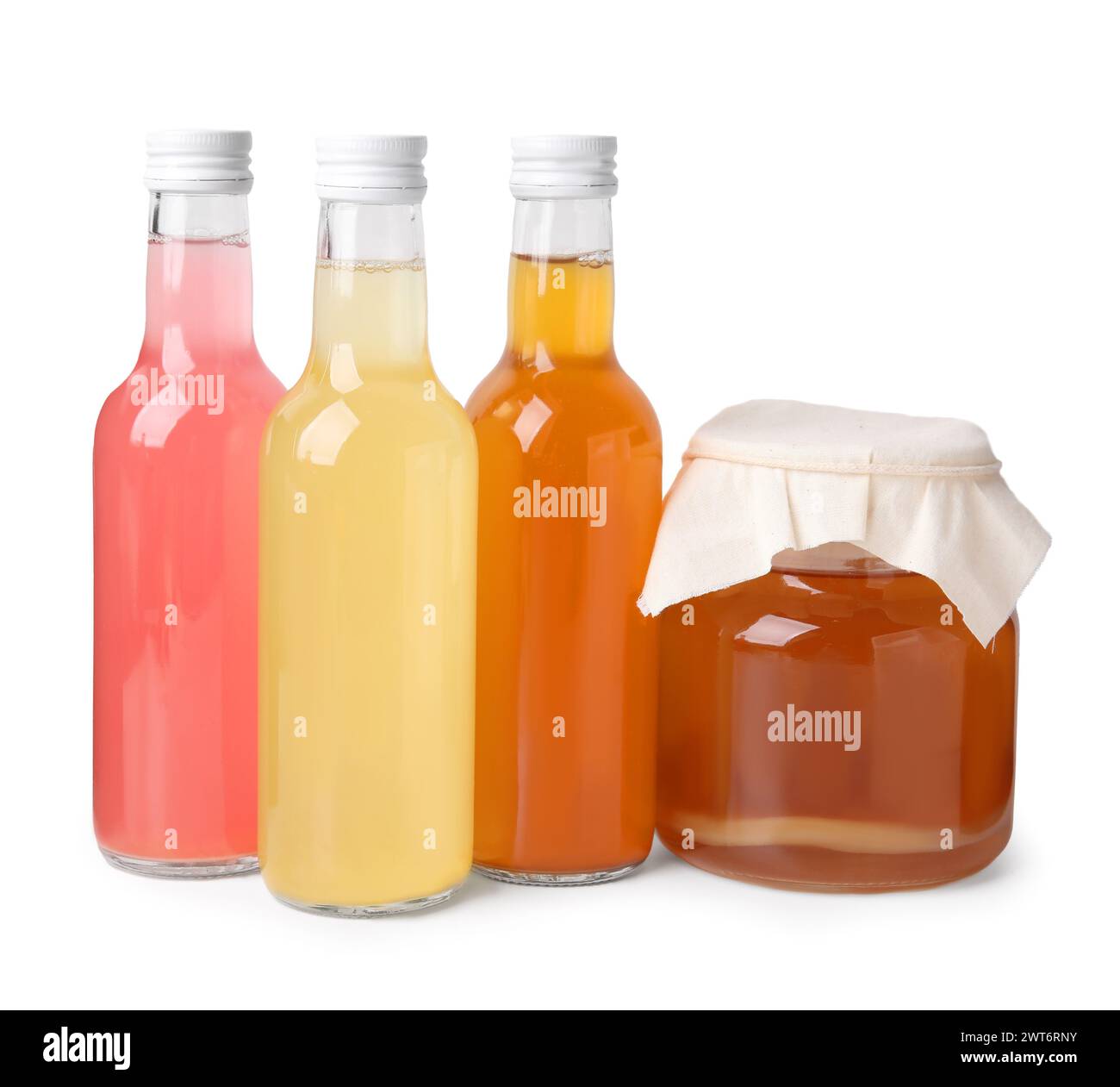 Delicious kombucha in glass bottles and jar isolated on white Stock ...