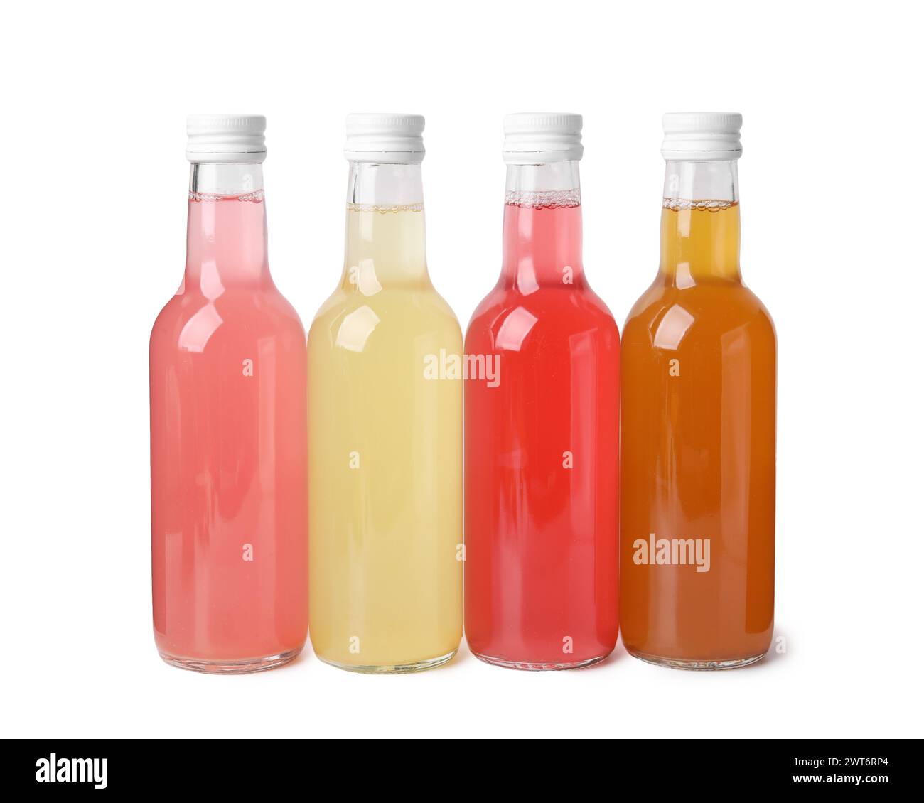 Delicious kombucha in glass bottles isolated on white Stock Photo - Alamy