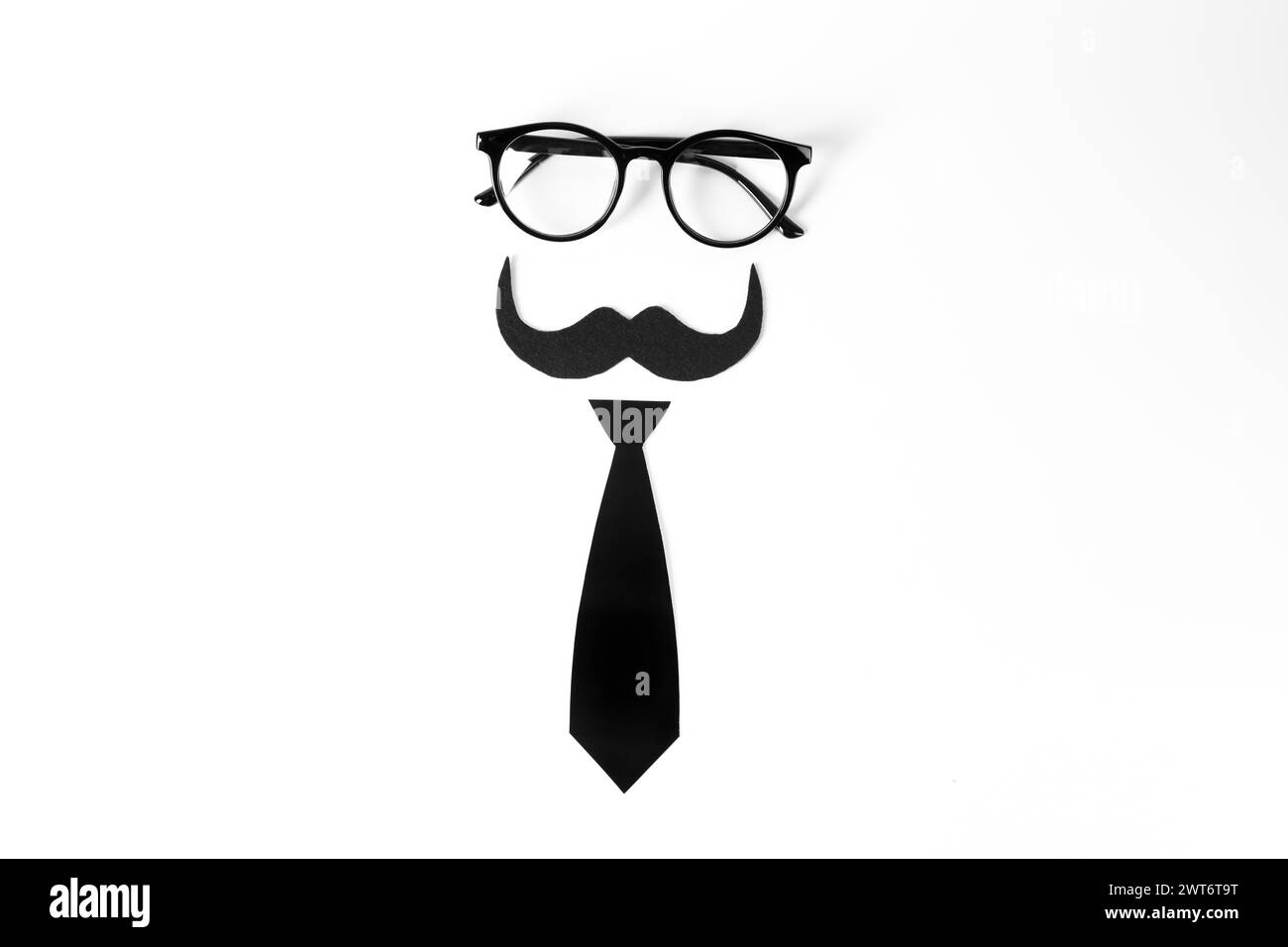 Fake mustache, tie and glasses on light background, top view Stock ...