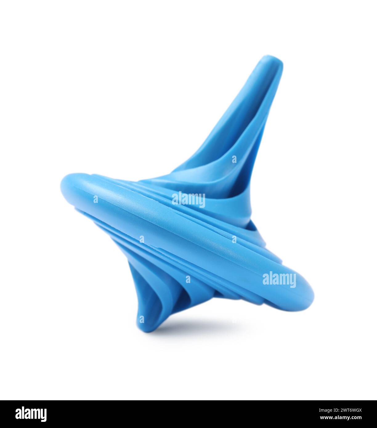 One blue spinning top isolated on white Stock Photo - Alamy