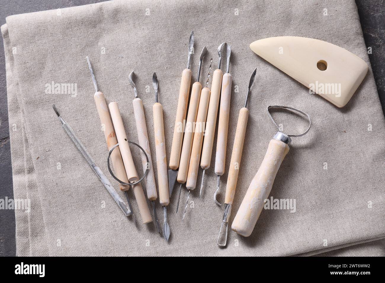 Set of different clay crafting tools on grey fabric, top view Stock ...