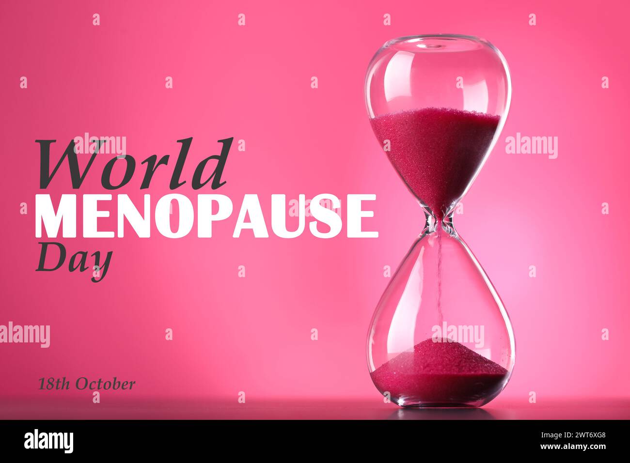 World Menopause Day - October, 18. Hourglass with red sand on bright ...