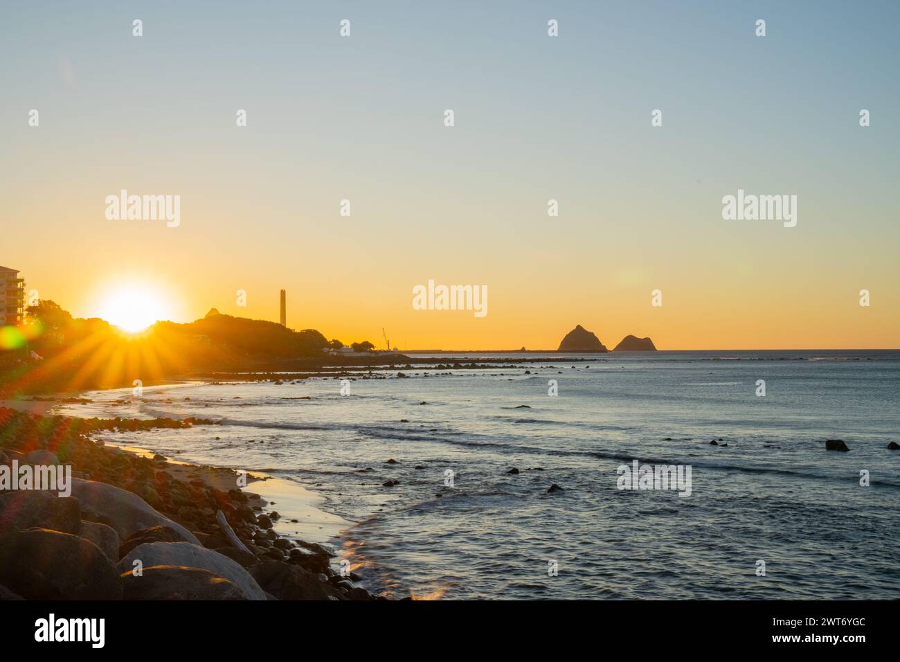 New plymouth waterfront view along coast to setting sun and New ...