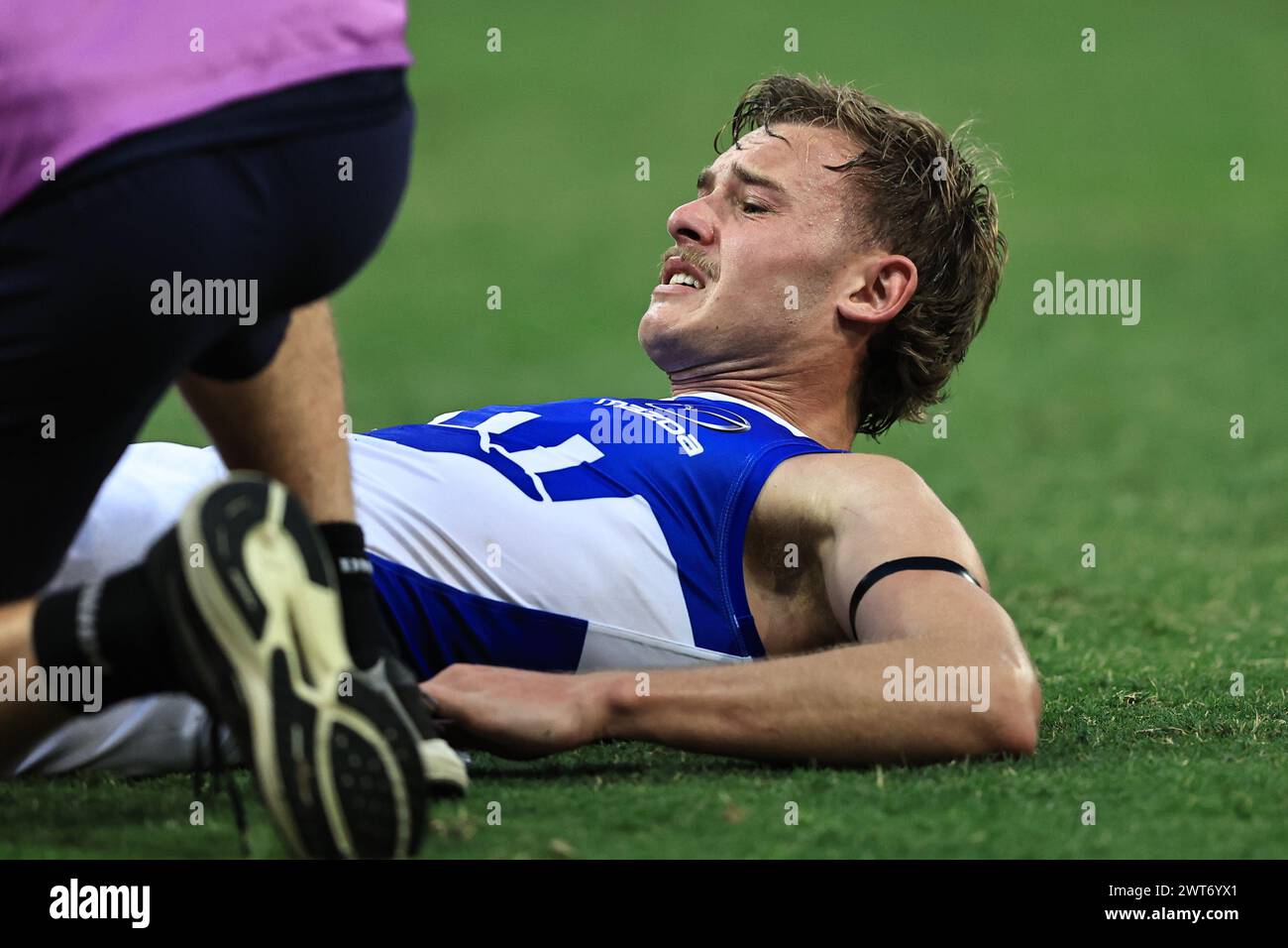 Sydney, Australia. 16th Mar, 2024. Josh Goater of the Kangaroos suffers ...