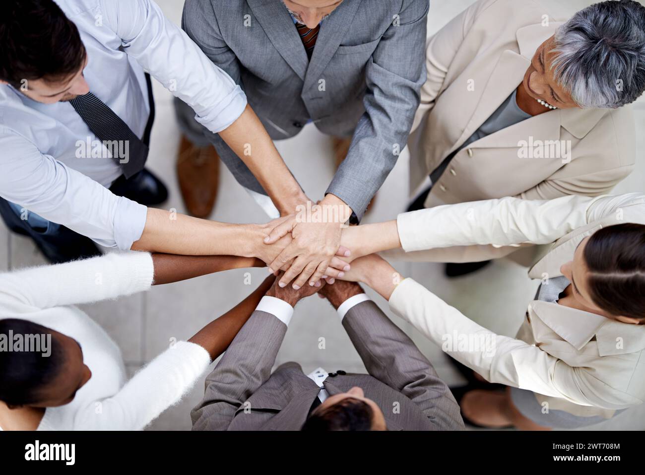 Group, top view or business people with hands in stack for mission goal ...