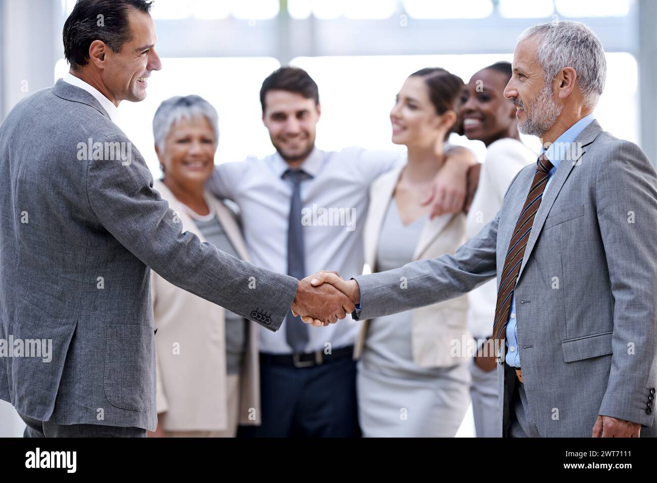 Business people, boss or shaking hands for deal, b2b collaboration or teamwork in office ...