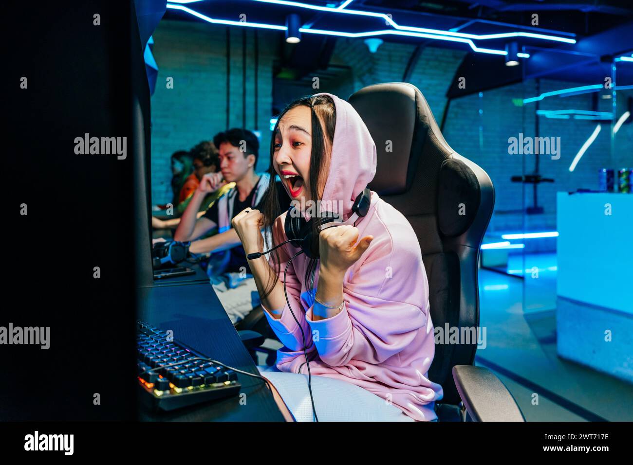 Multiethnic group of young friends playing videogames - Team of ...