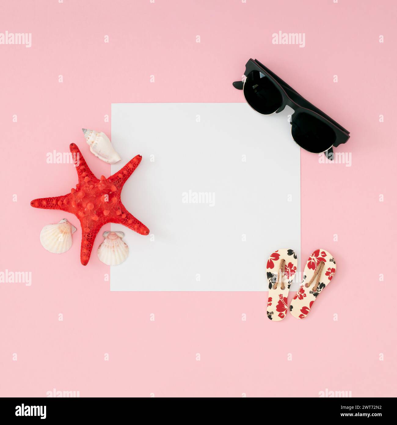 Trendy summer layout made with sunglasses, red starfish, sea shells ...