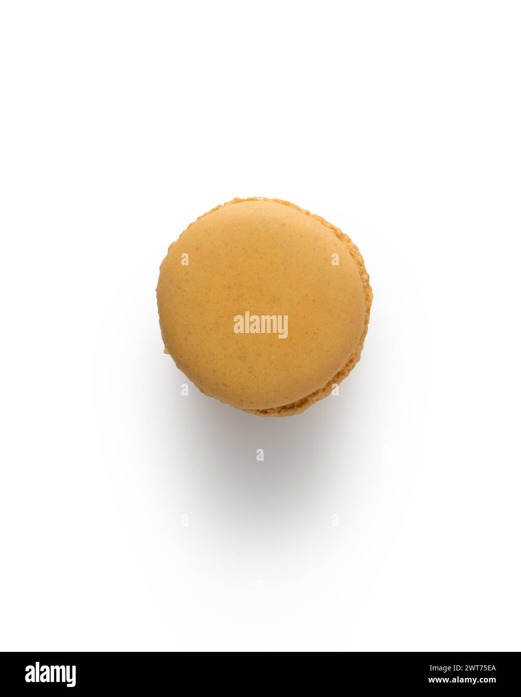 Orange french macaron top view isolated on white background with shadow ...