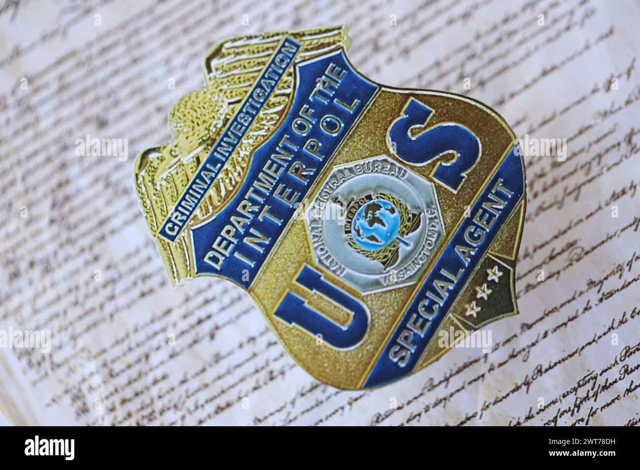 KYIV, UKRAINE - MARCH 9, 2024 US Interpol Special Agent badge on United ...