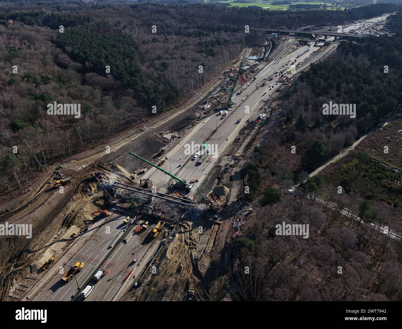 Workman on the section of the M25 between Junctions 10 and 11, in ...