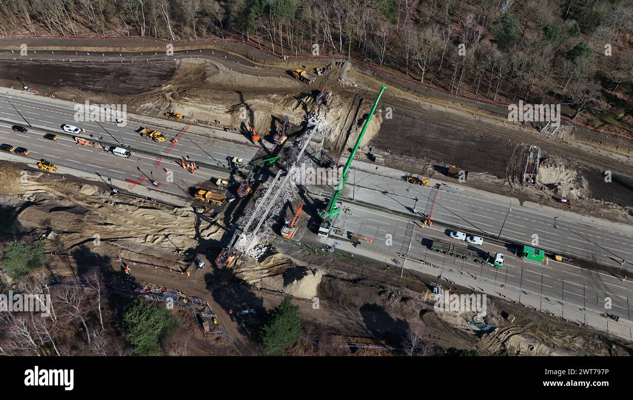 Workman on the section of the M25 between Junctions 10 and 11, in ...
