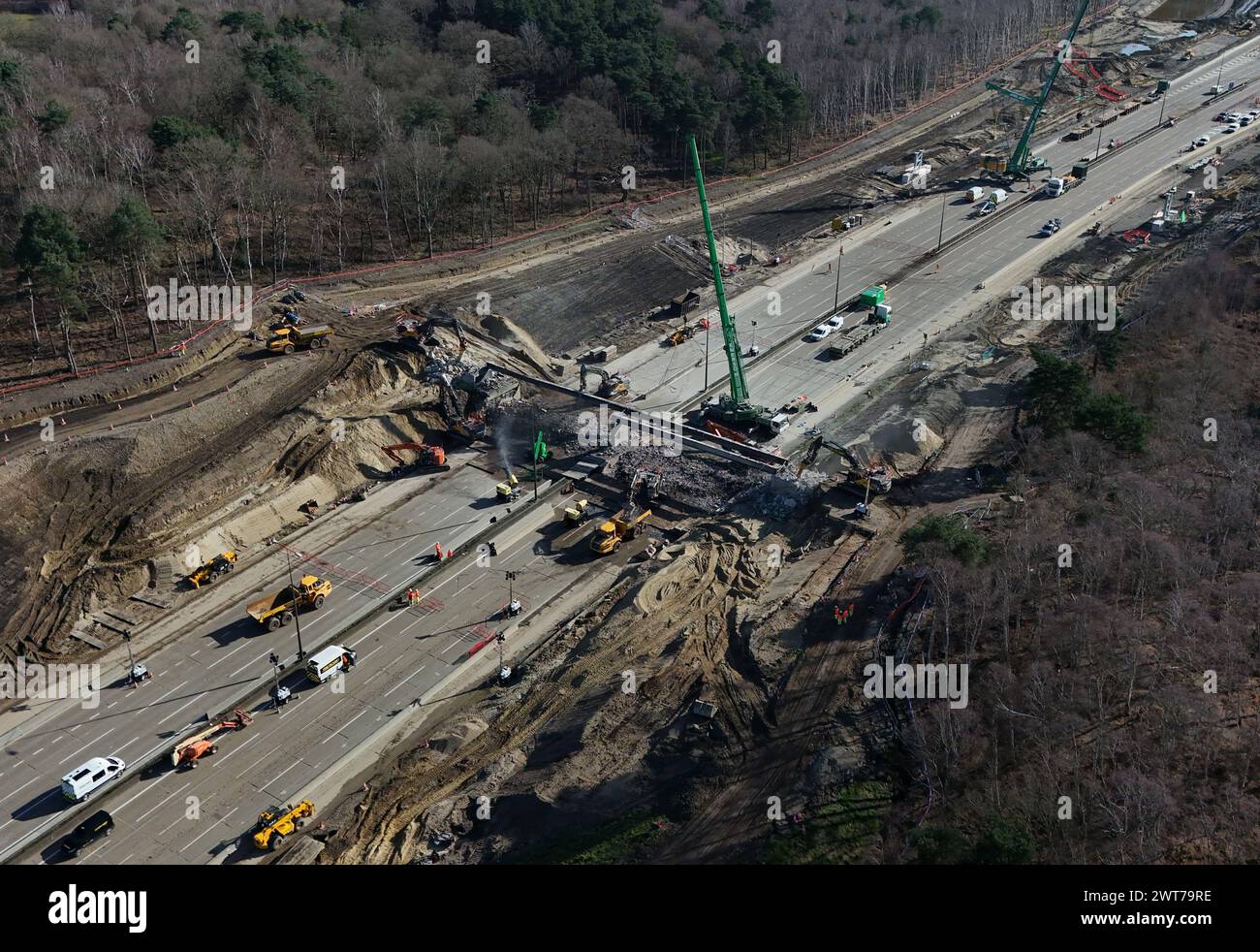 Workman on the section of the M25 between Junctions 10 and 11, in ...