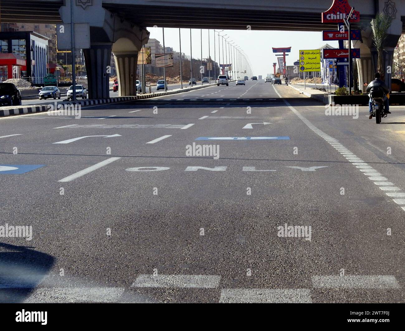 Cairo, Egypt, December 7 2022: A road sign on the asphalt indication a ...