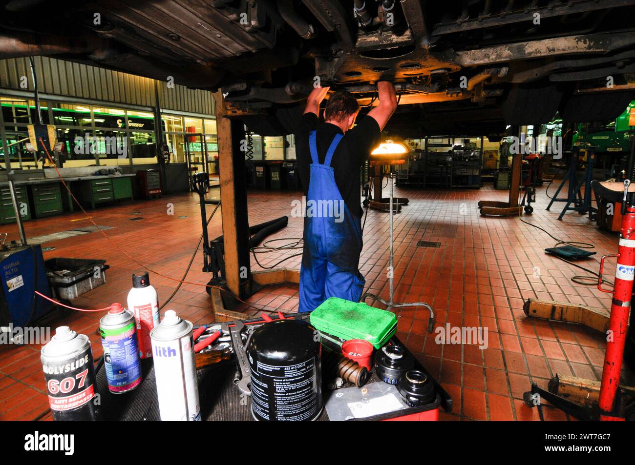 car repair after a breakdown, fixing broken parts of an automobile car ...