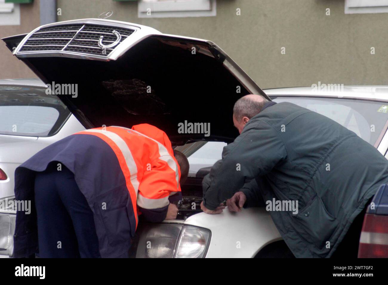car repair after a breakdown, fixing broken parts of an automobile car ...