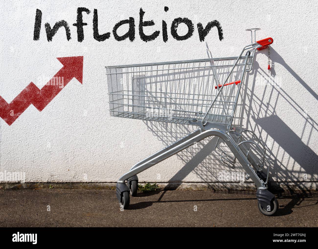 16 March 2024: Empty shopping cart in front of a wall with a sign ...